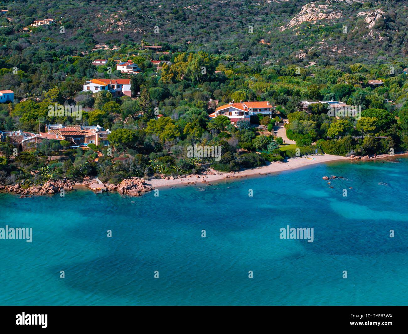 Aerial View of Sardinia's Coastal Area with Turquoise Waters and Houses ...