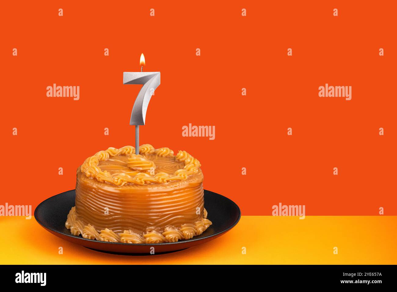Birthday candle number 7 - Cake with dulce de leche frosting Stock ...