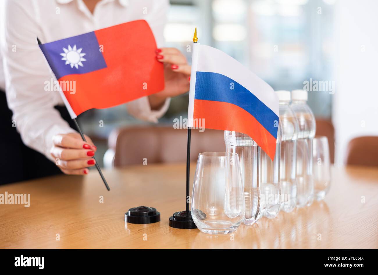 Flags of Taiwan and Russia stand on negotiating table in office Stock ...