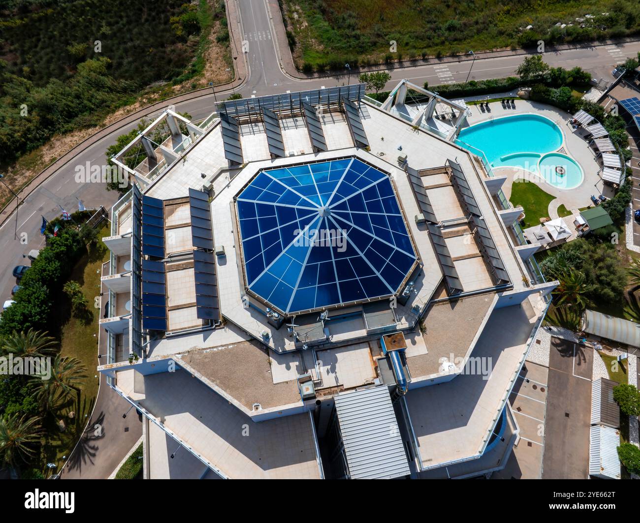 Aerial View of Octagonal Building with Blue Glass Dome in Sardinia ...