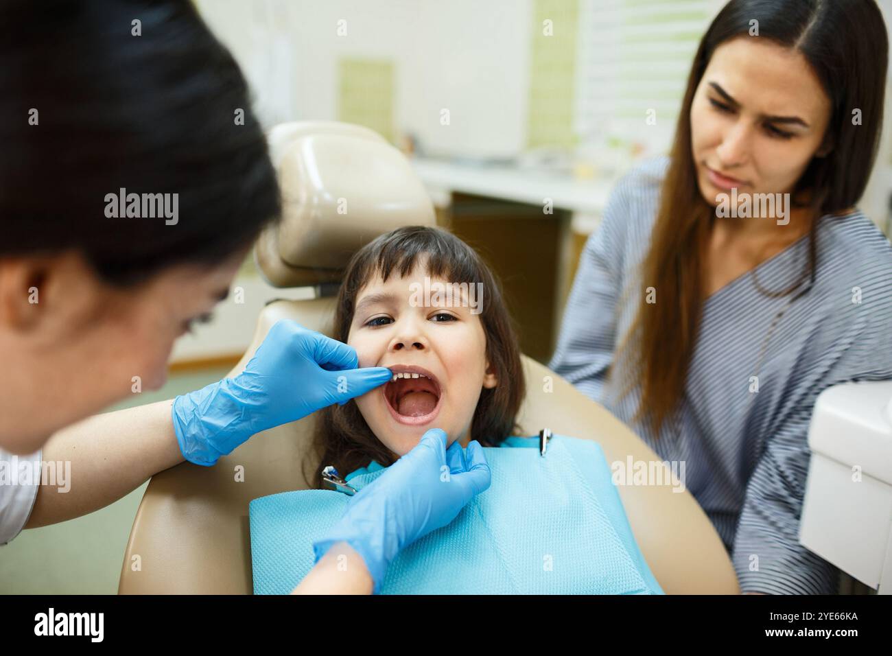 Little Patient Having Medical Exam With Doctor In Office Stock Photo ...