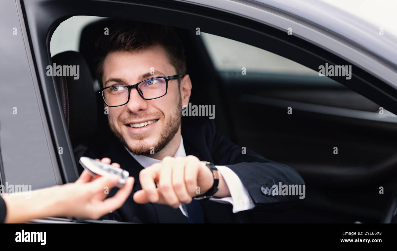 Handsome businessman on drivers hi-res stock photography and images - Alamy