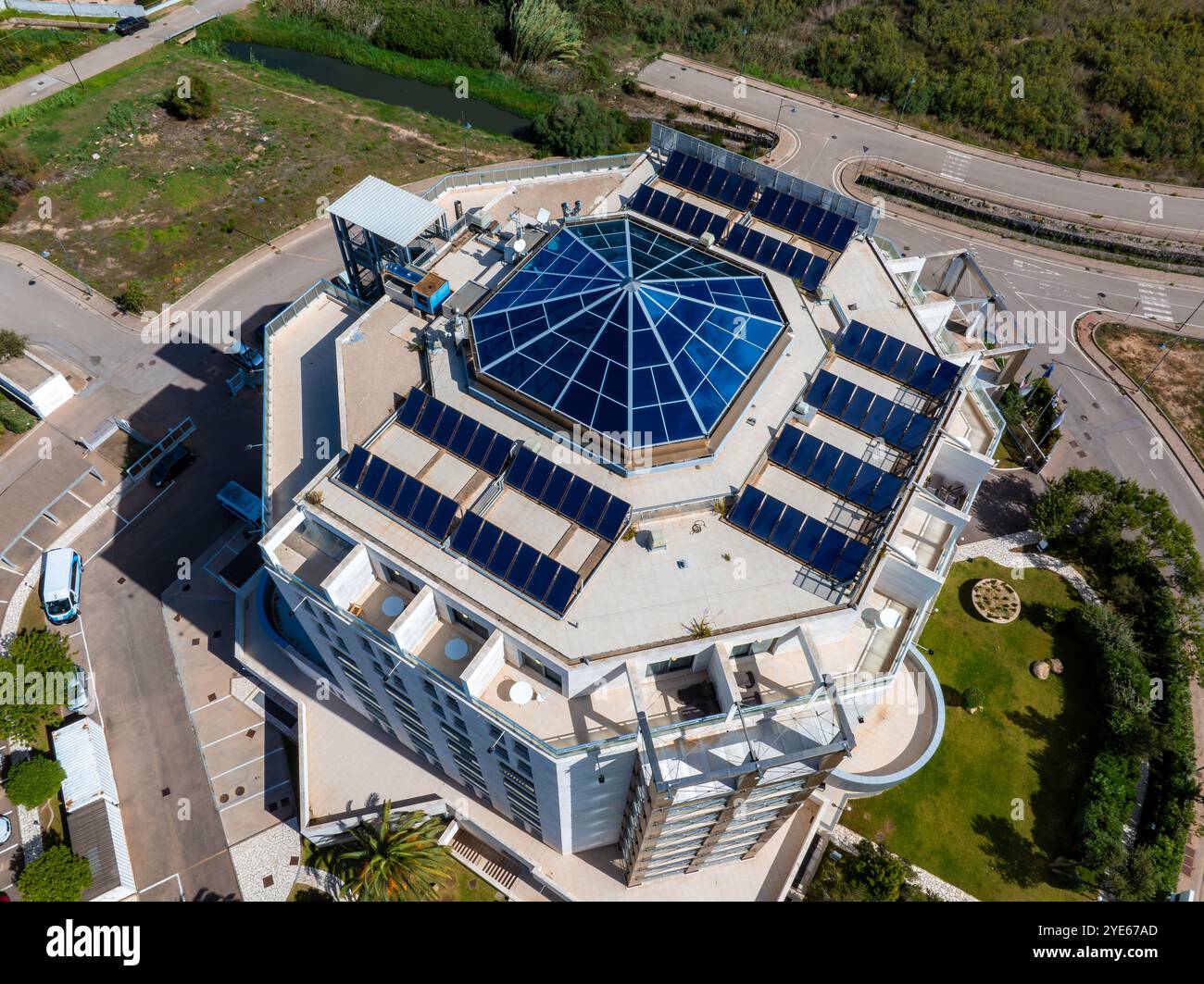 Aerial View of Octagonal Building with Blue Glass Dome in Sardinia ...