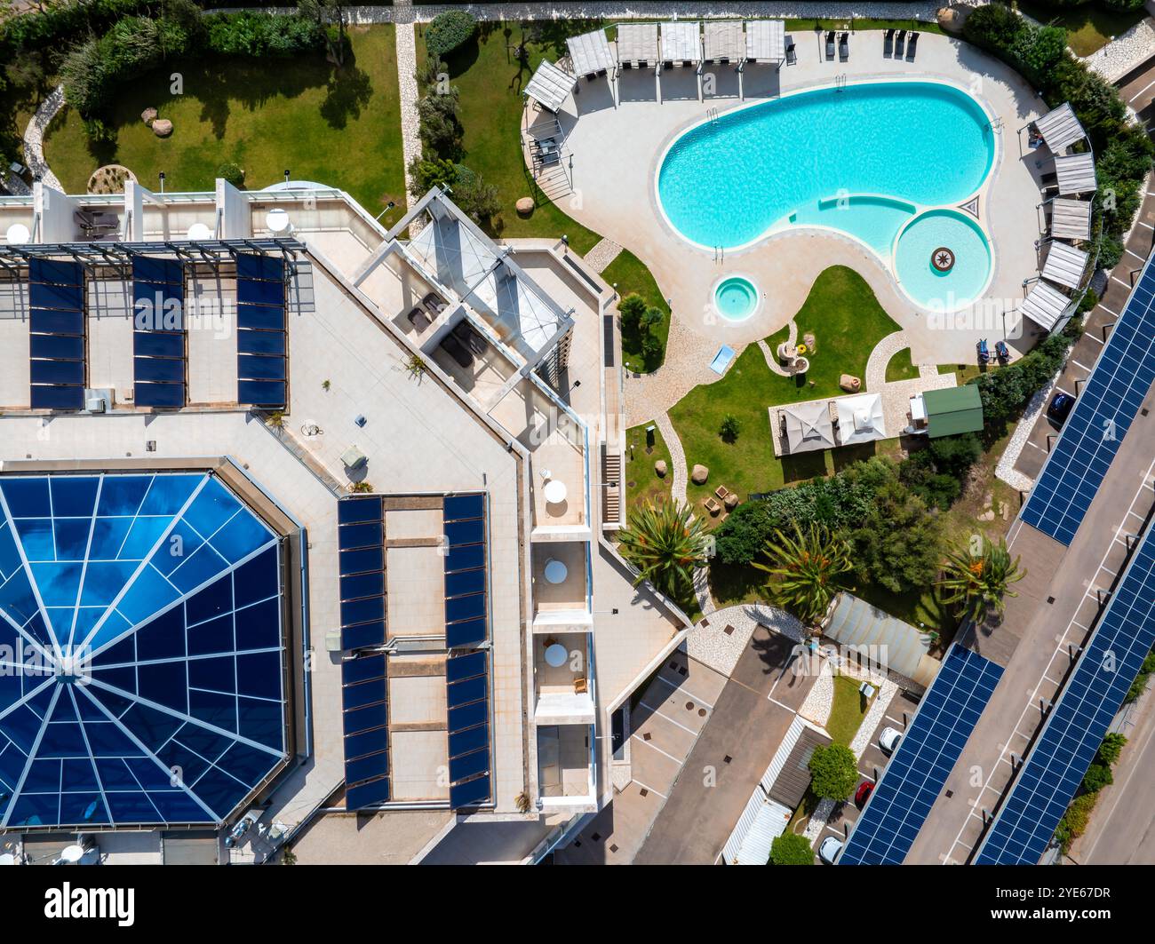Aerial View of Modern Building Complex with Blue Glass Roof in Sardinia ...
