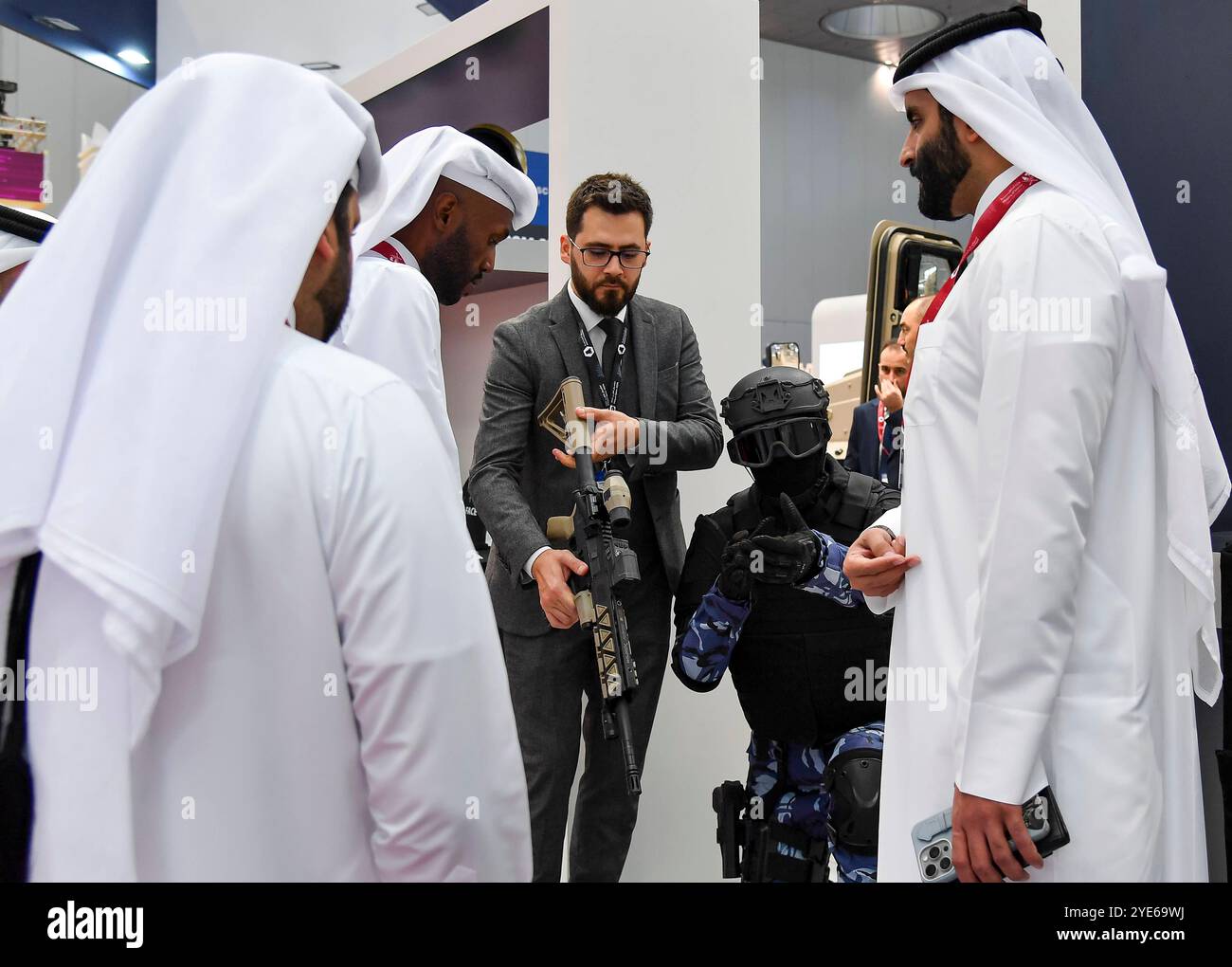 THE MILIPOL QATAR 2024 EXHIBITION IN QATAR Visitors are inspecting a ...