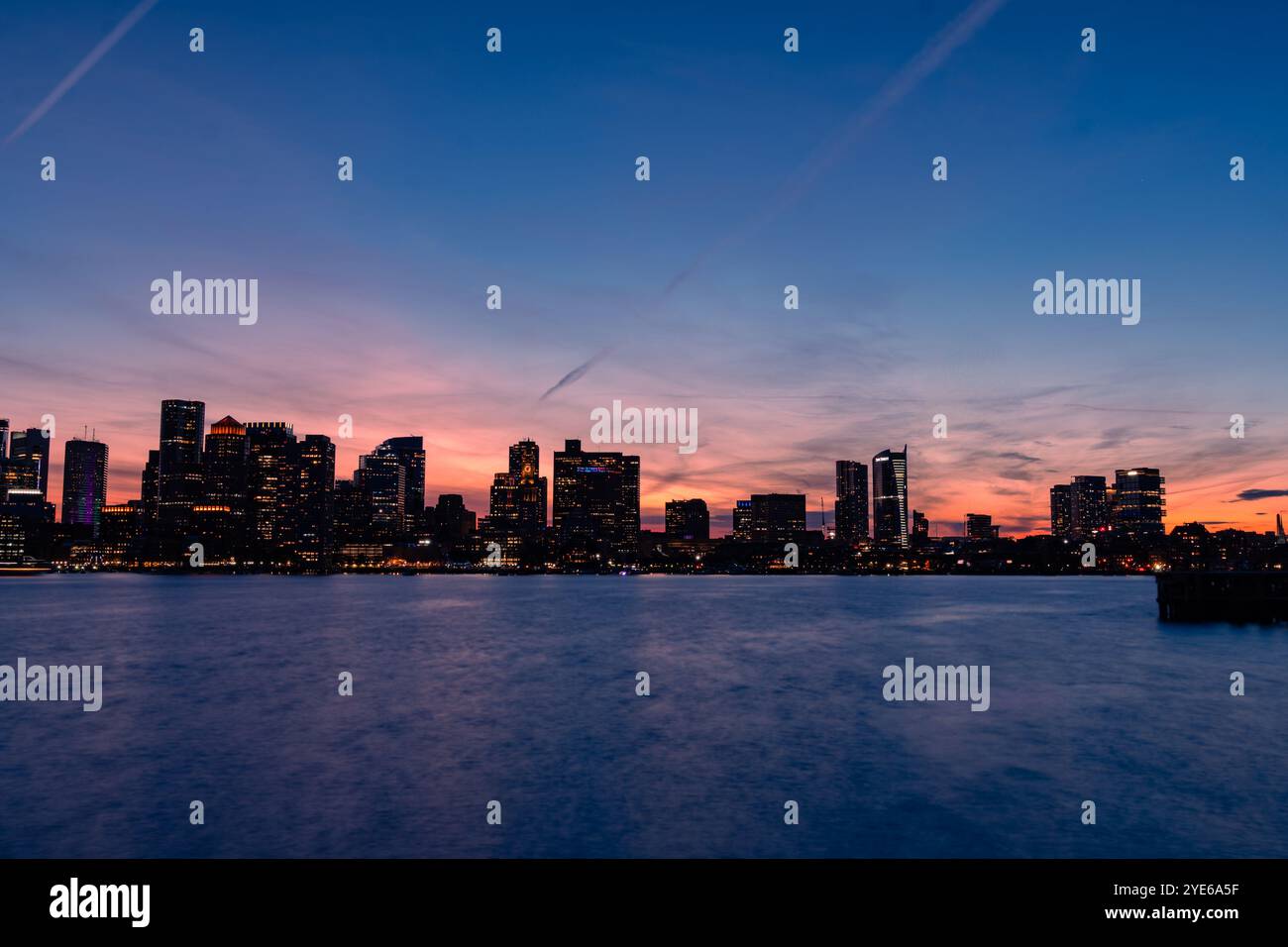 Boston skyline at night with colorful sky Stock Photo - Alamy