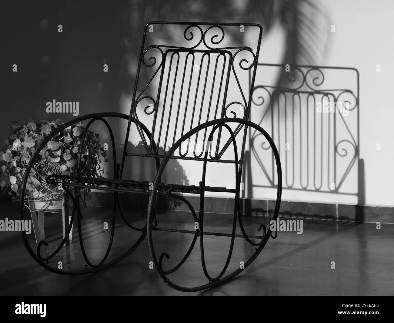 Metal Rocking Chair with Shadows in Black and White Stock Photo - Alamy