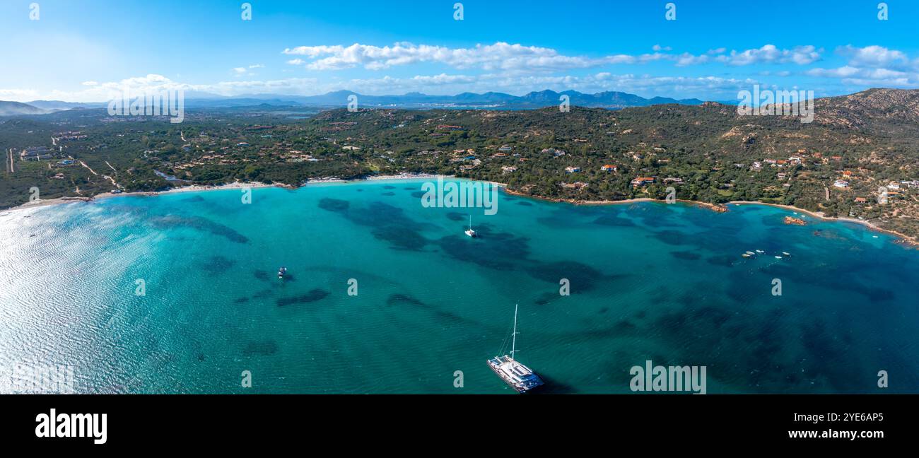 Aerial View of Curved Bay with Sailboats on Sardinia Island, Italy ...