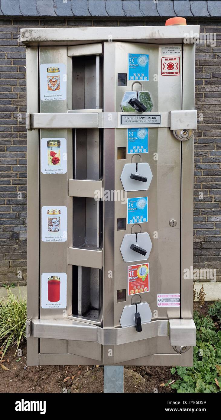 Grave vending machine at a cemetery, with stickers alarmed and burglary ...