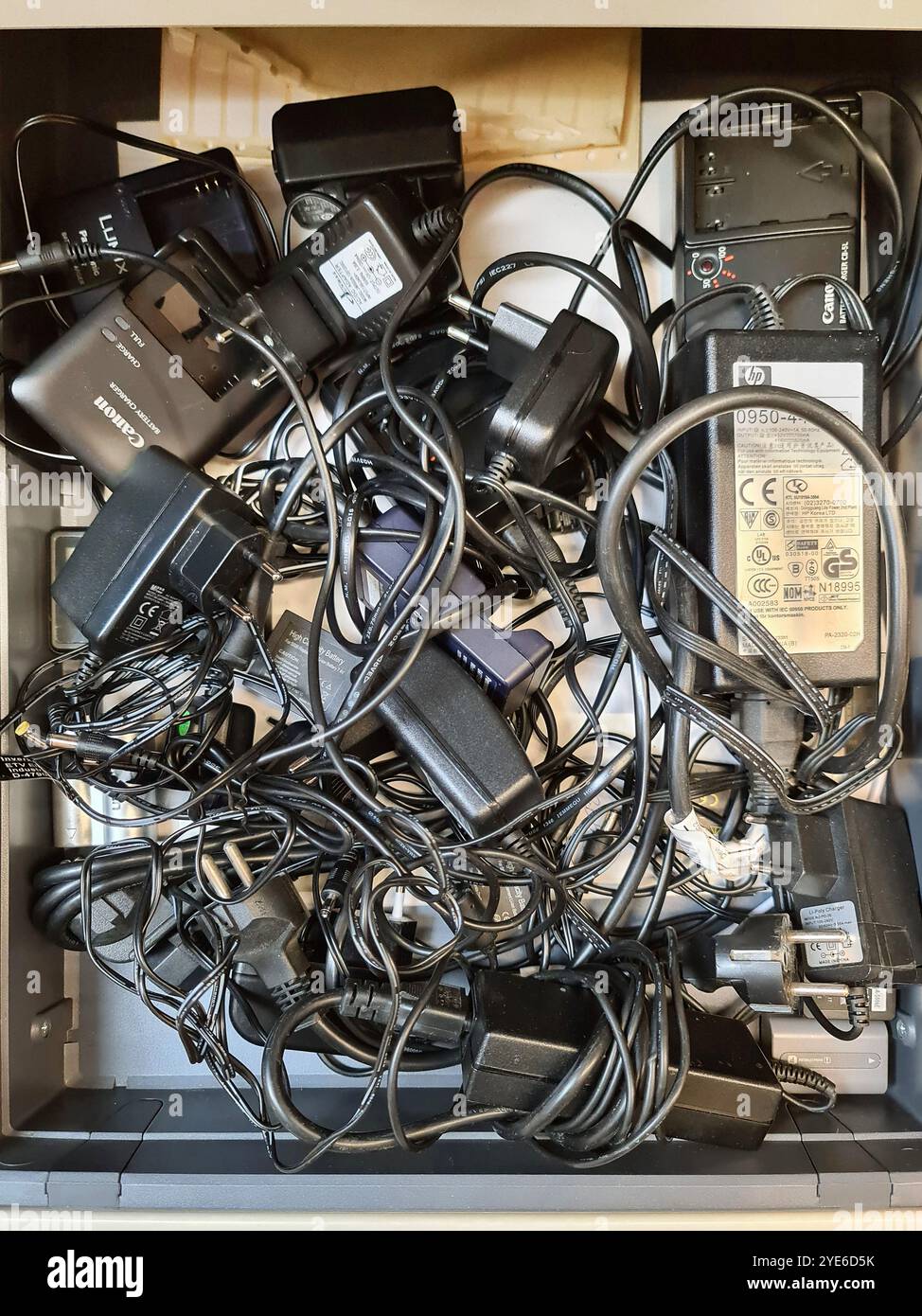 various charging cables and adapters in a drawer Stock Photo - Alamy