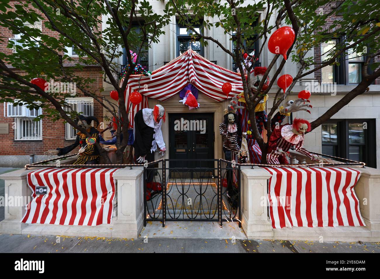 Killer clowns, balloons and circus bigtop colors stand out outside a ...