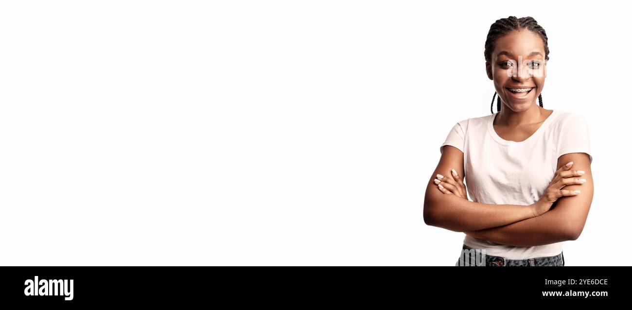 African Lady With Braces Posing Crossing Hands Over White Background ...