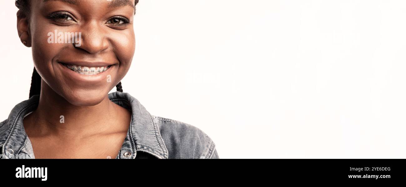 African lady braces smiling hi-res stock photography and images - Alamy