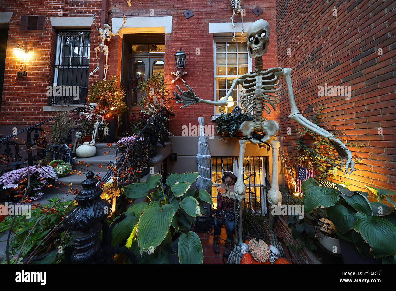 A large skeleton with eyes stands guard outside a Upper East Side ...