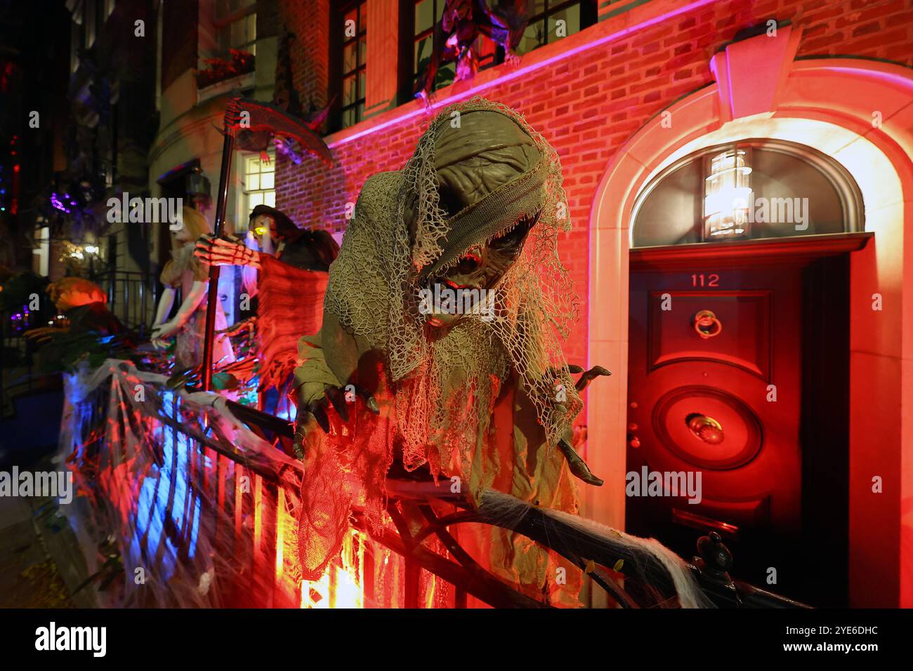 A creature all taped up scares visitors outside a Upper East Side ...