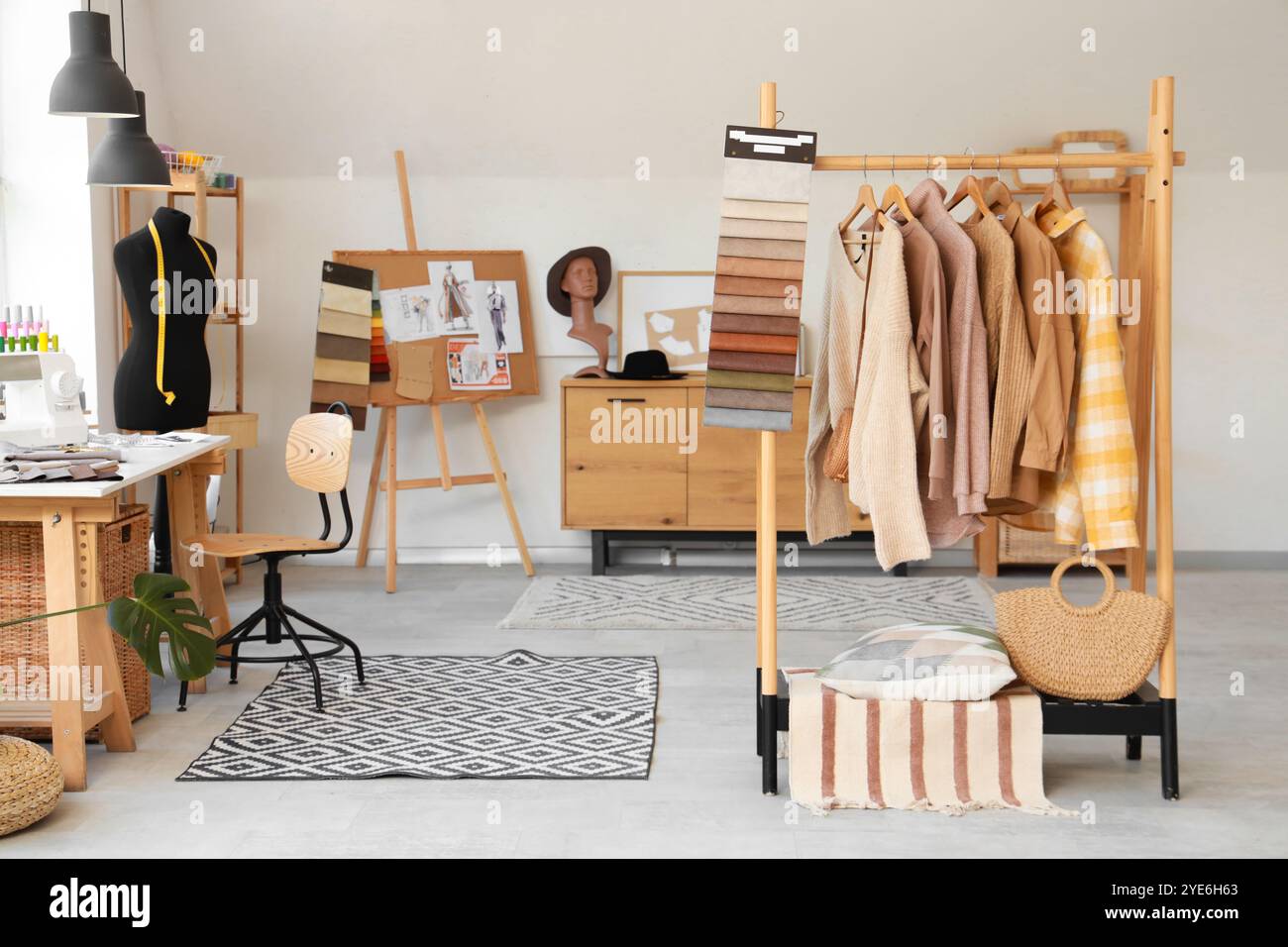 Clothes rack with fabric samples in fashion designer's studio Stock ...
