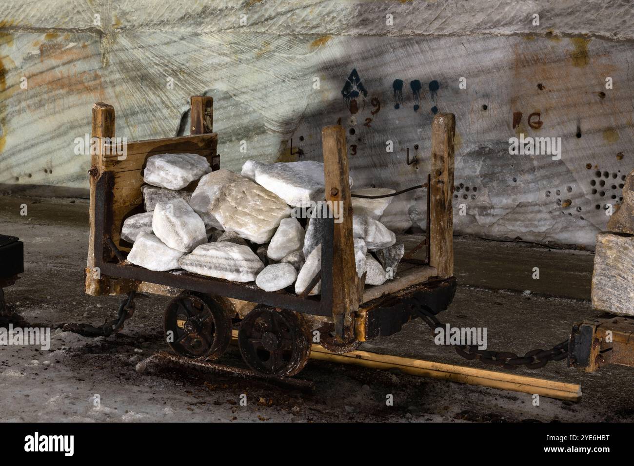 Old mining wagon with salt rocks inside Unirea public salt mine at ...