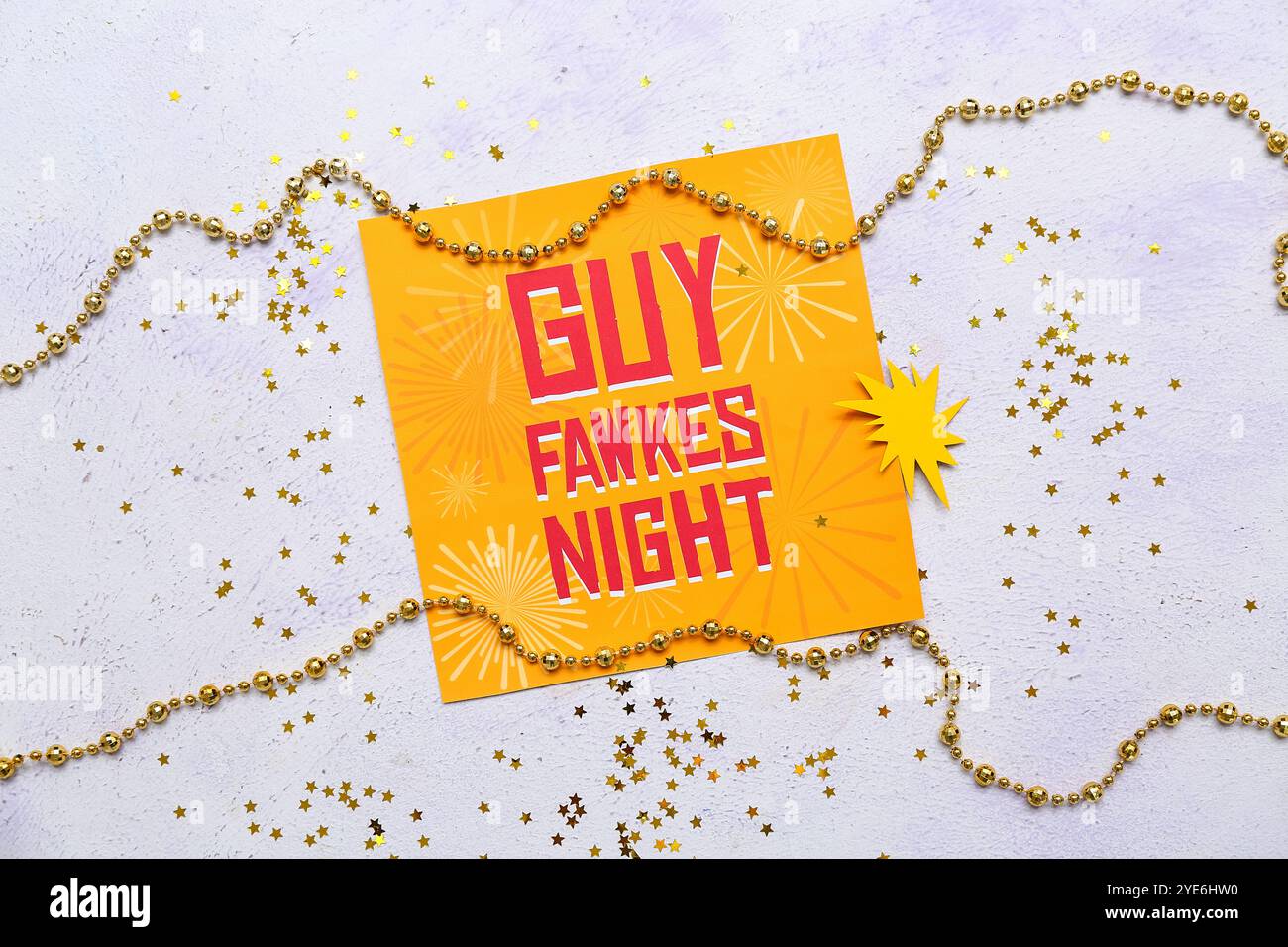 Greeting card for Guy Fawkes night, confetti and beads on light ...