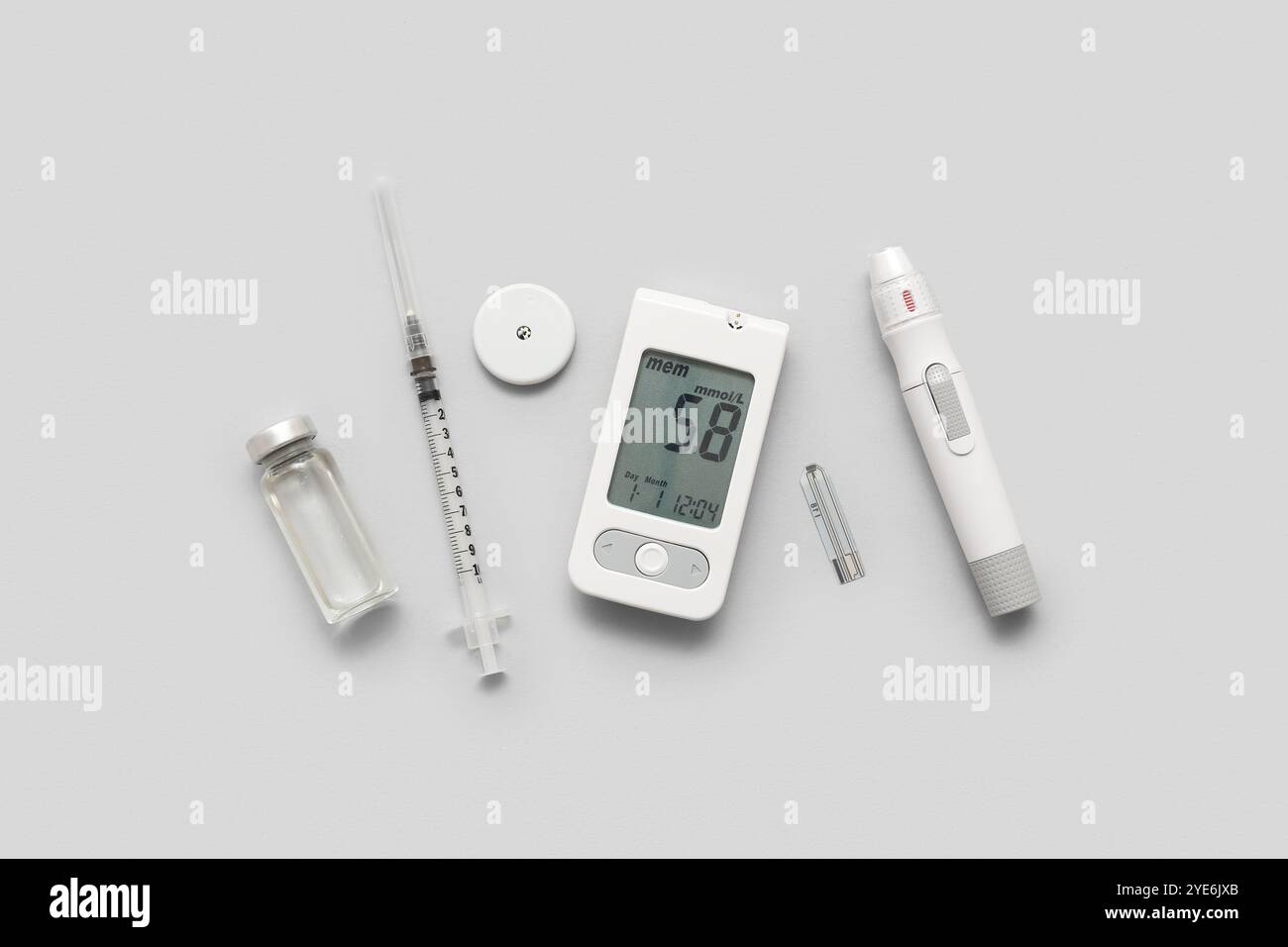 Glucometer with lancet pen, glucose sensor and insulin on light ...