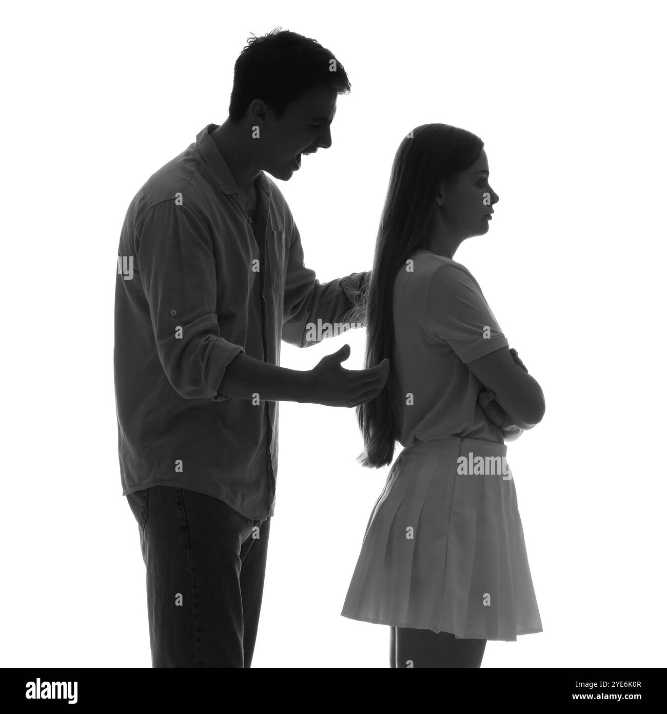 Silhouette of man shouting at his girlfriend on white background ...