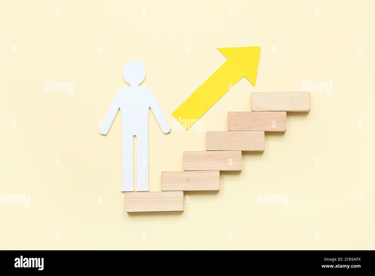 Paper human figure with blocks and arrow on beige background. Coaching ...
