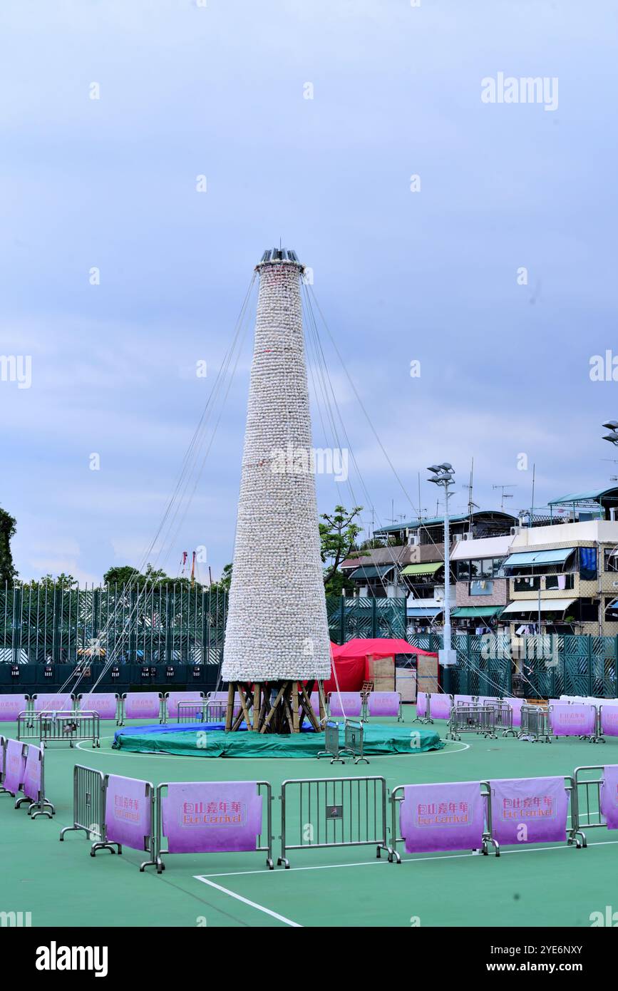 Bun tower built on playground in front of Pak Tai Temple for grabbing ...