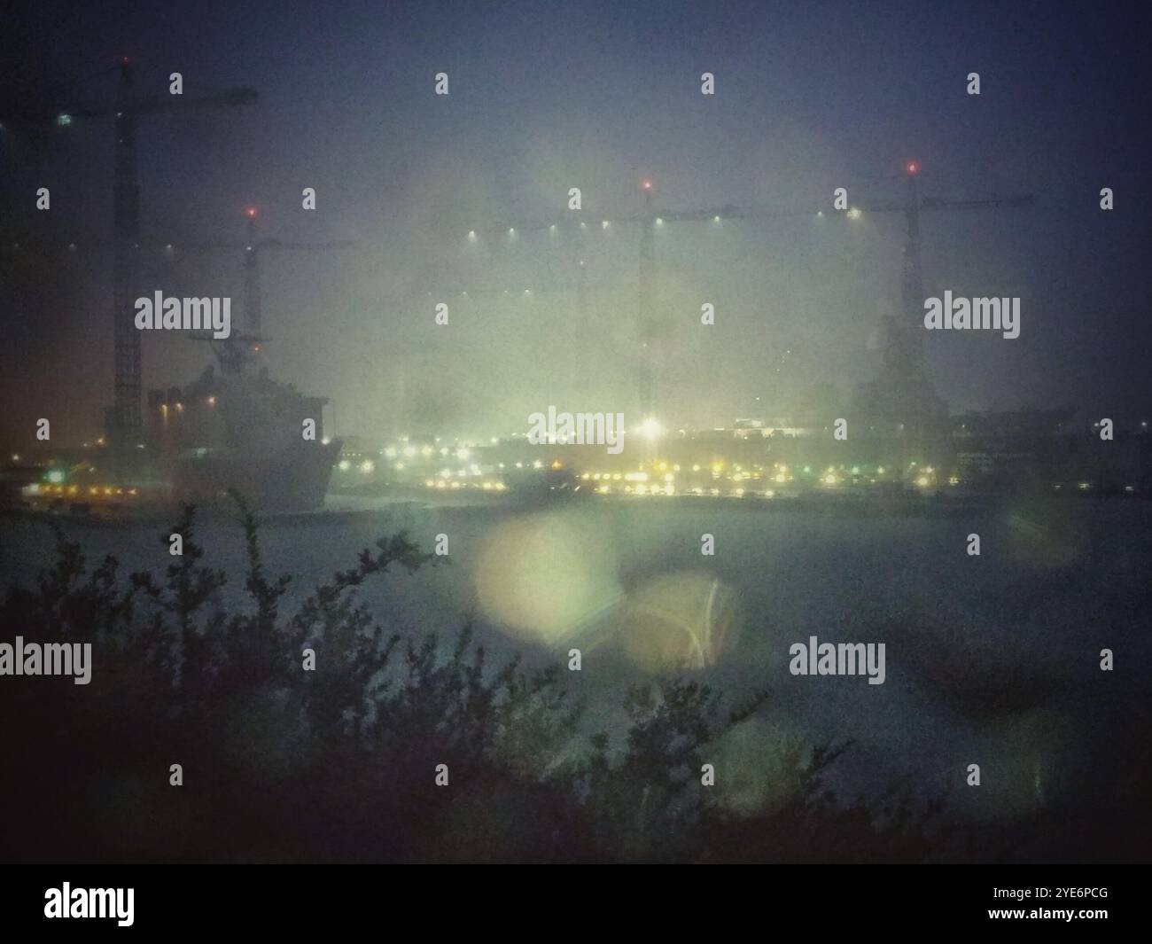 Naval shipyard silhouette in the dark night rain Virginia Stock Photo ...