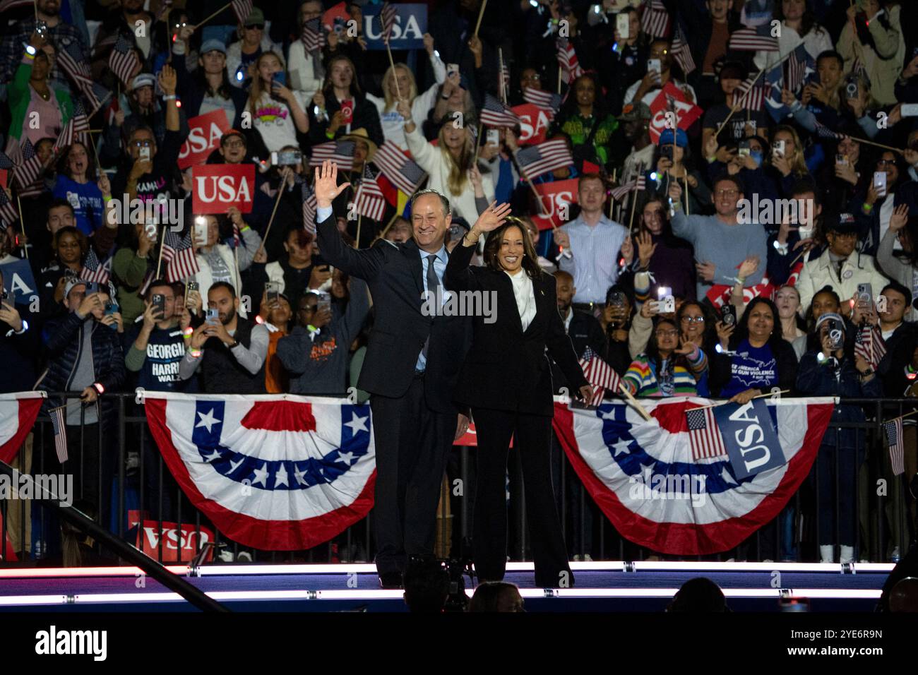 Vice President Kamala Harris waves goodbye with her husband Doug Emhoff ...