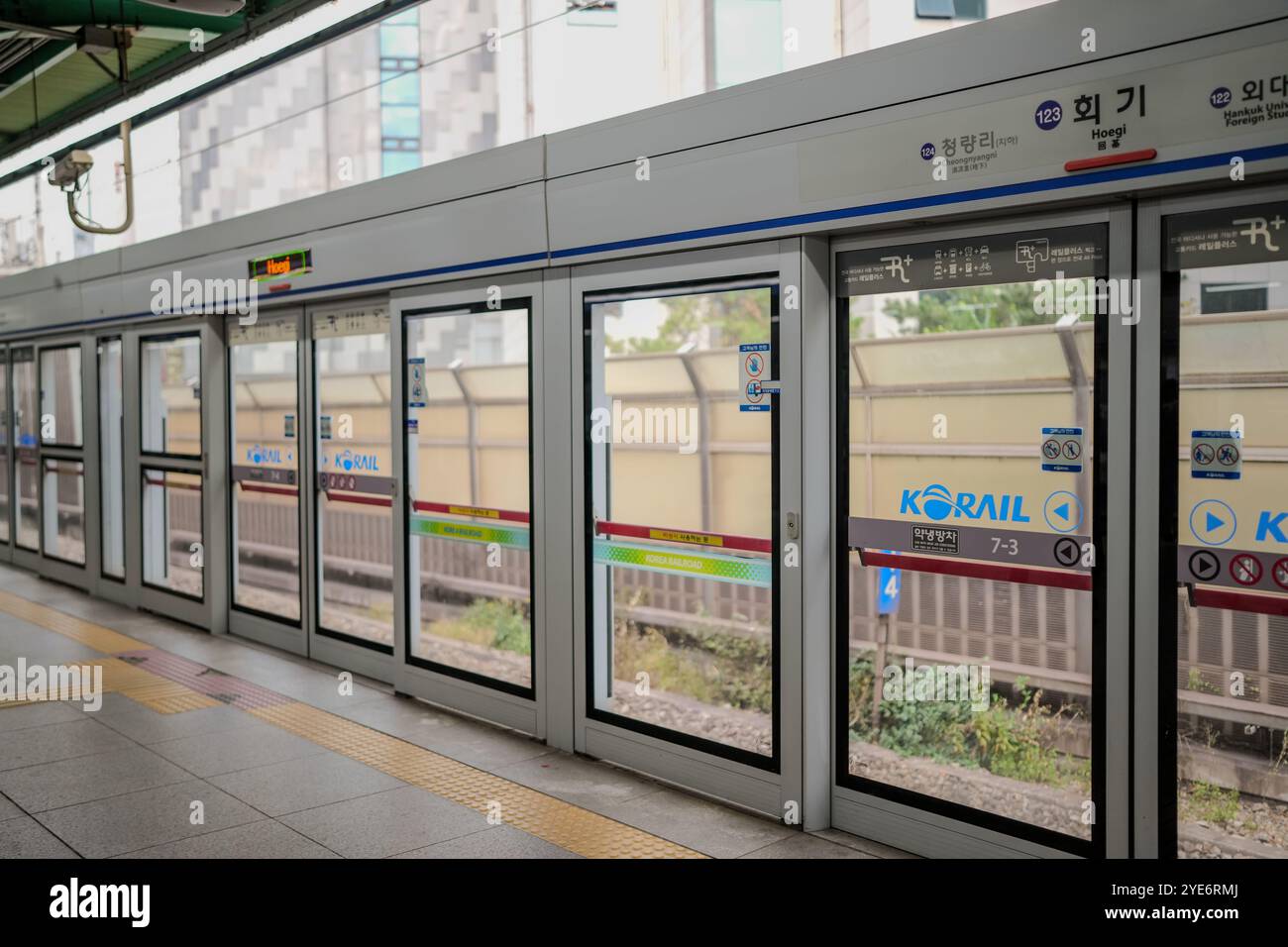 Train station with a sign that says Korail. The train station has a lot ...