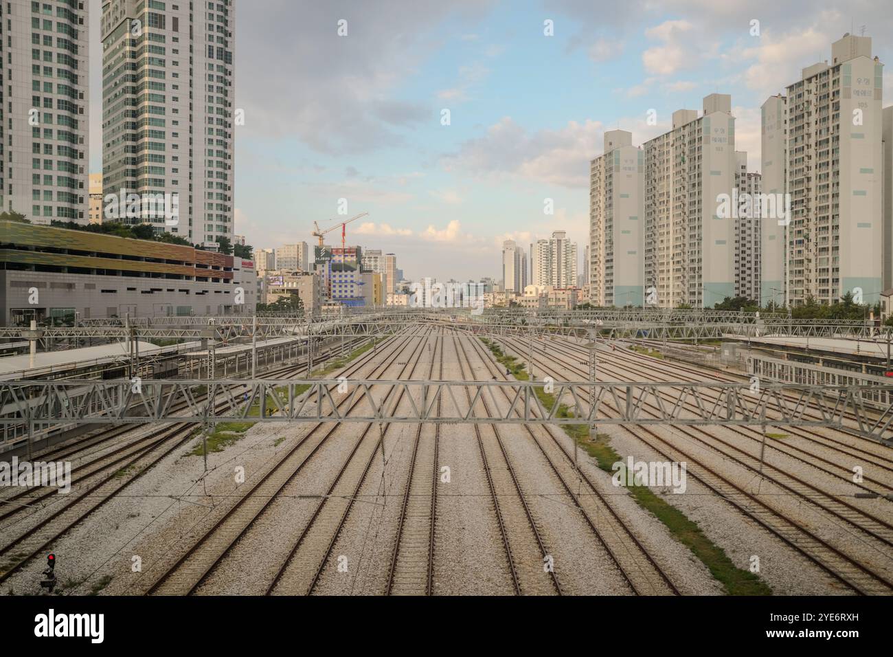 Train track with a train in the distance. The train is not visible. The ...