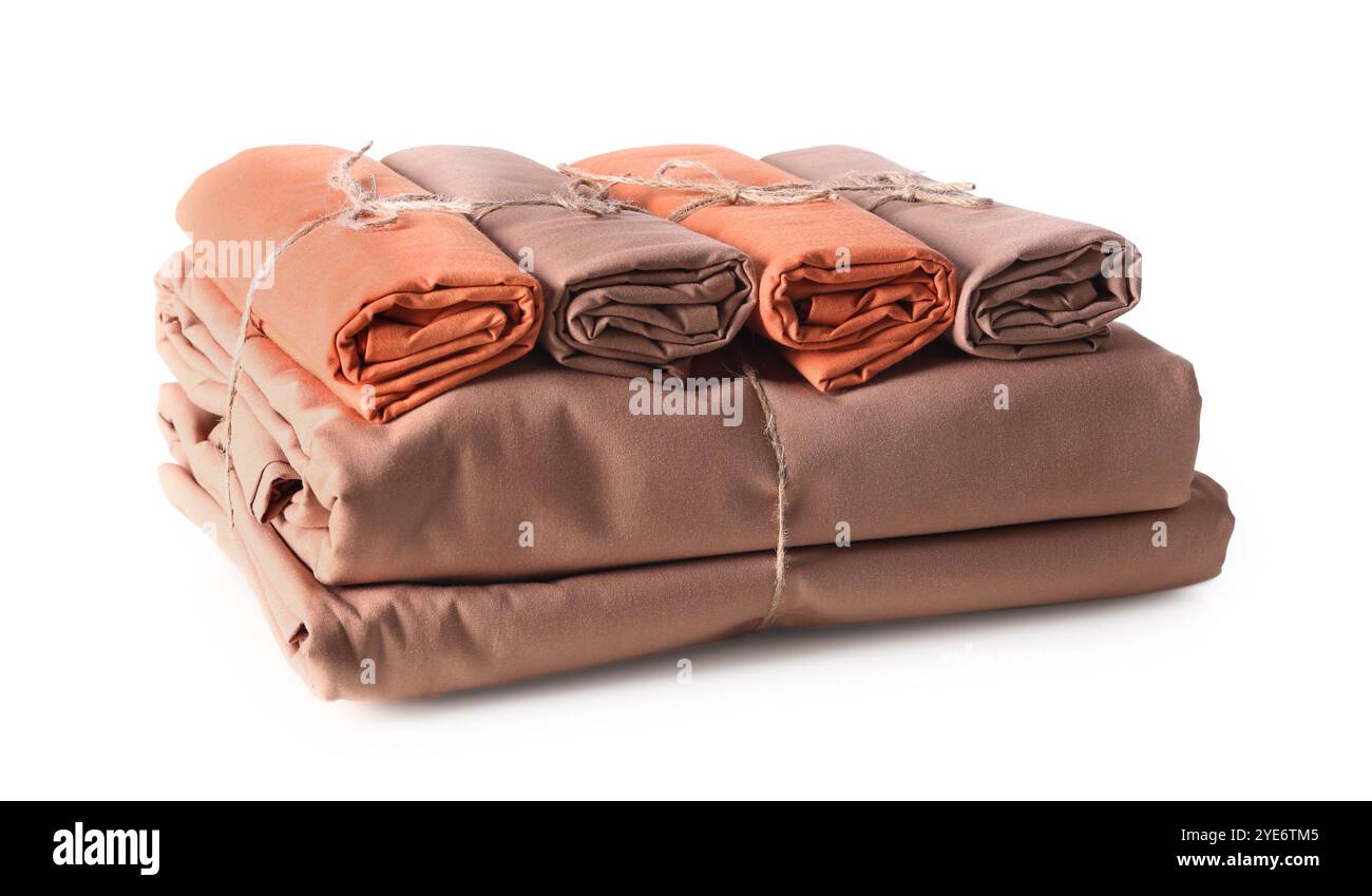 Stack of clean bed sheets tied with rope isolated on white Stock Photo ...