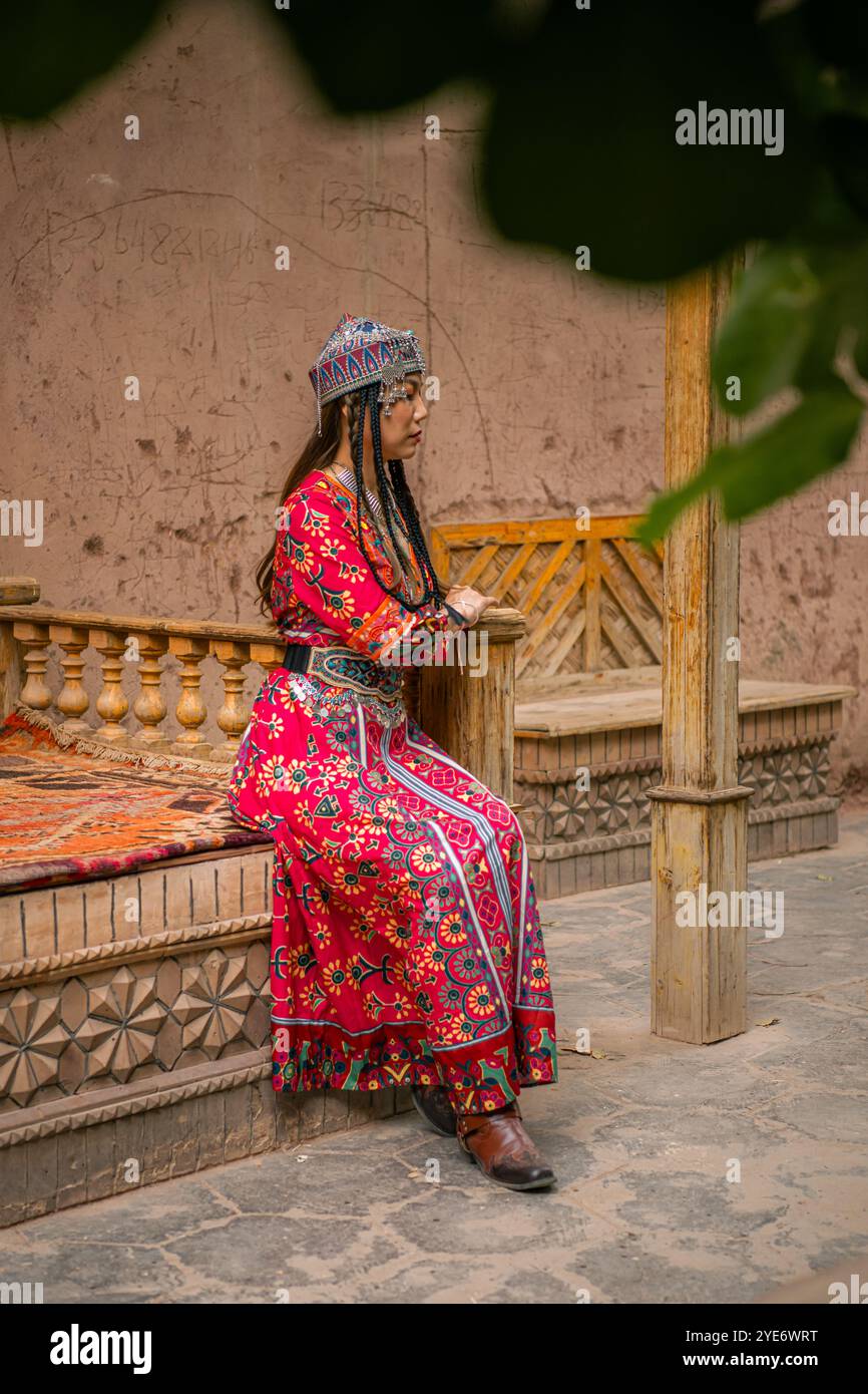 Kashgar, Xinjiang, China - JULY, 17, 2023: A Chinese girl wearing ...