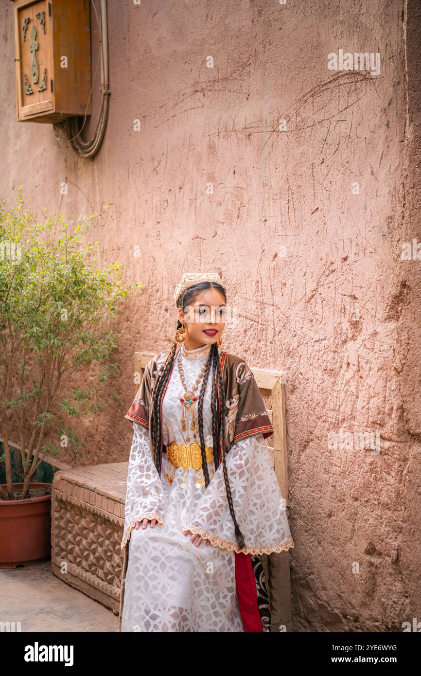 Kashgar, Xinjiang, China - JULY, 17, 2023: A girl wearing Uighur ...