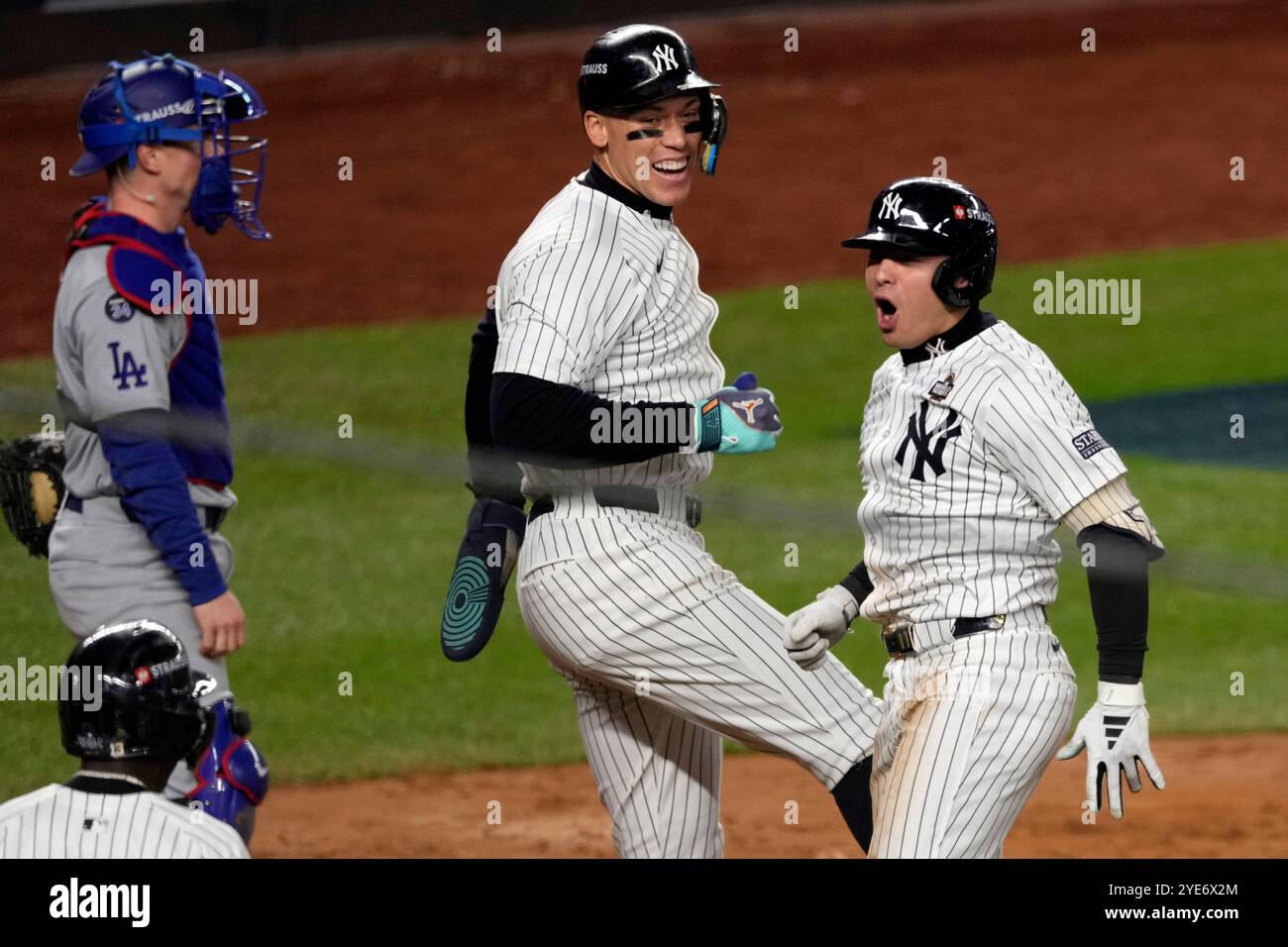 New York Yankees' Anthony Volpe, right, celebrates with Aaron Judge ...