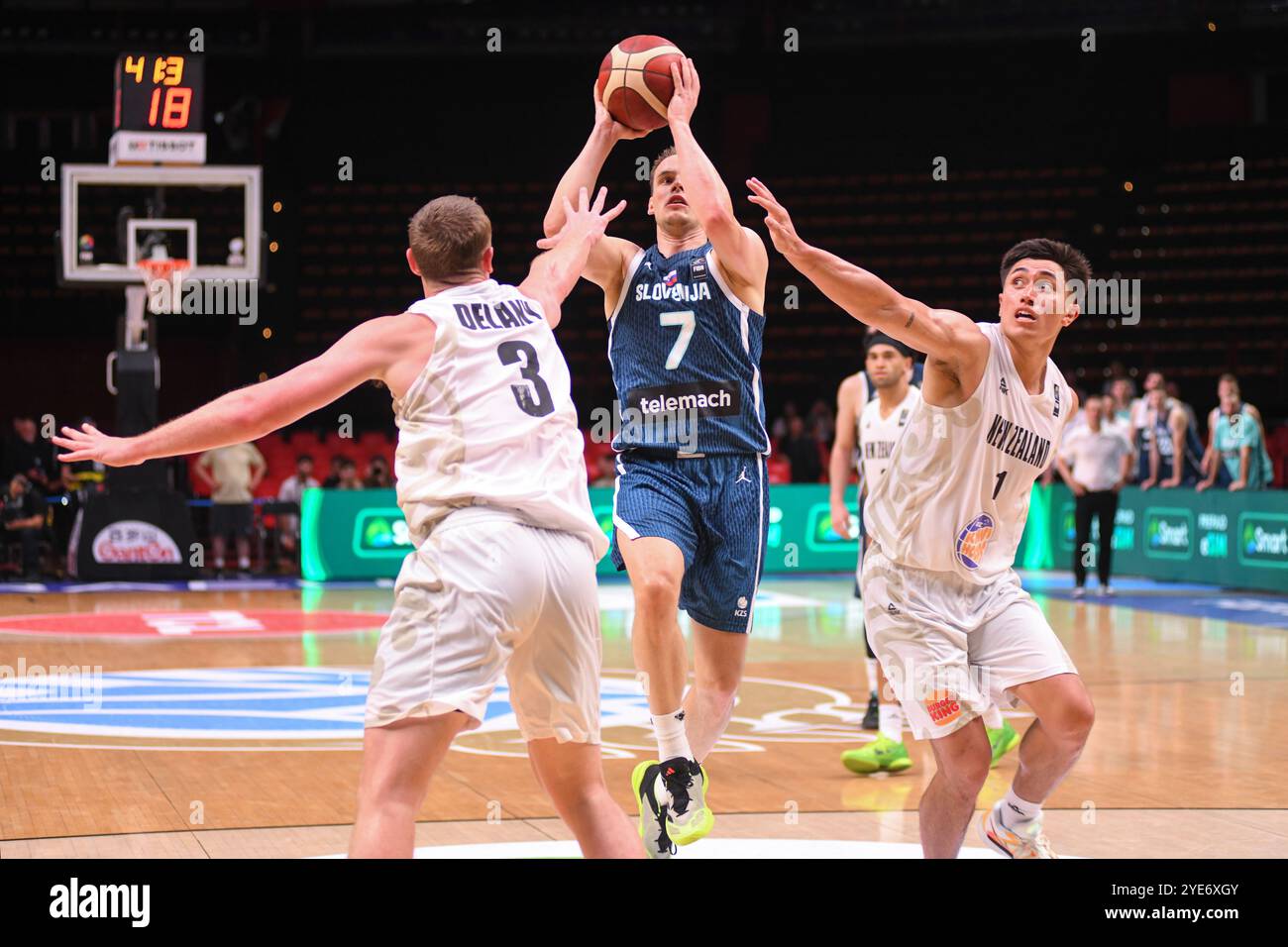 Klemen Prepelic (Slovenia) shooting over Reuben Te Rangi and Finn ...