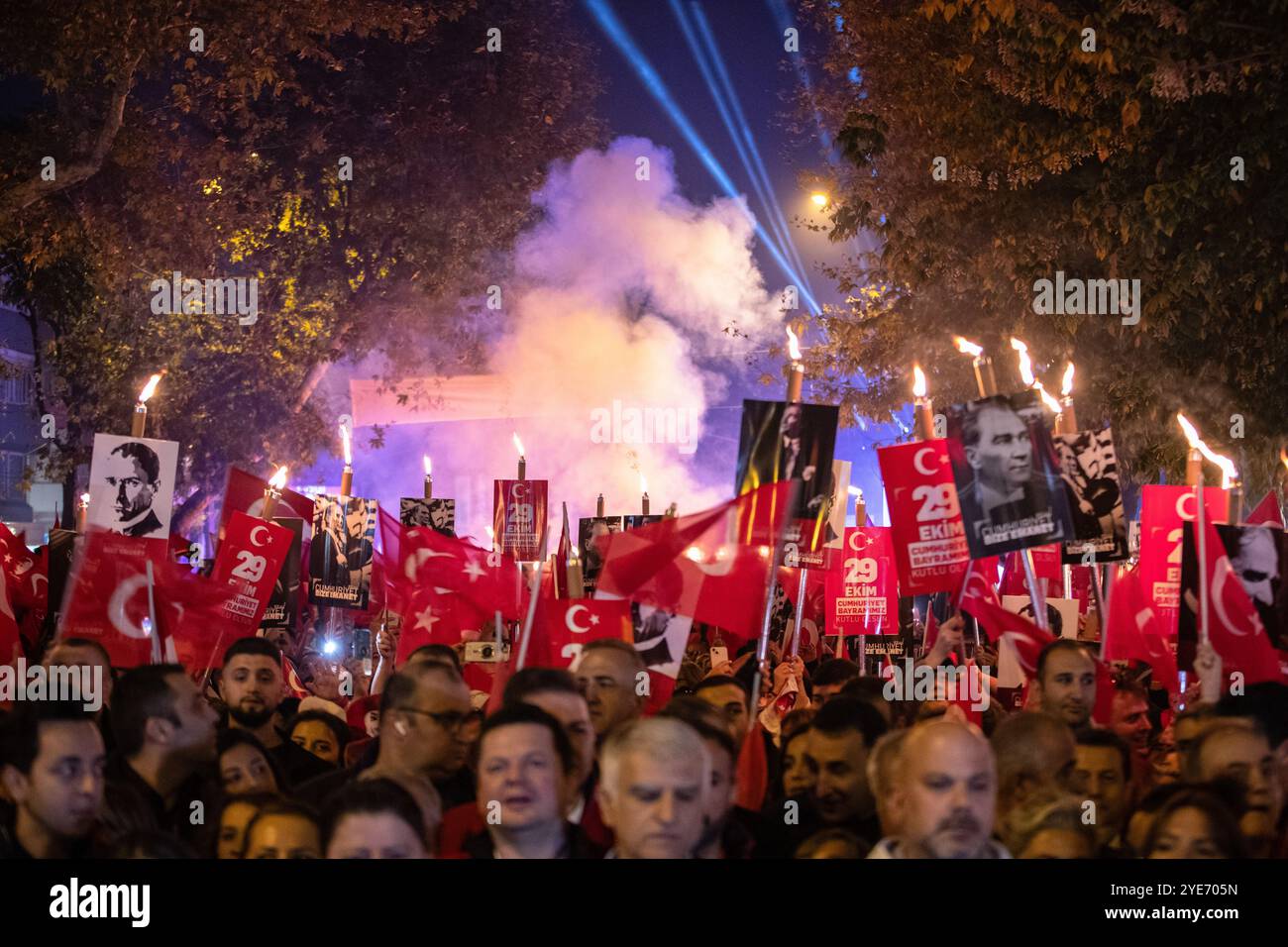 People wave the Turkish flags during the Republic March held for the ...