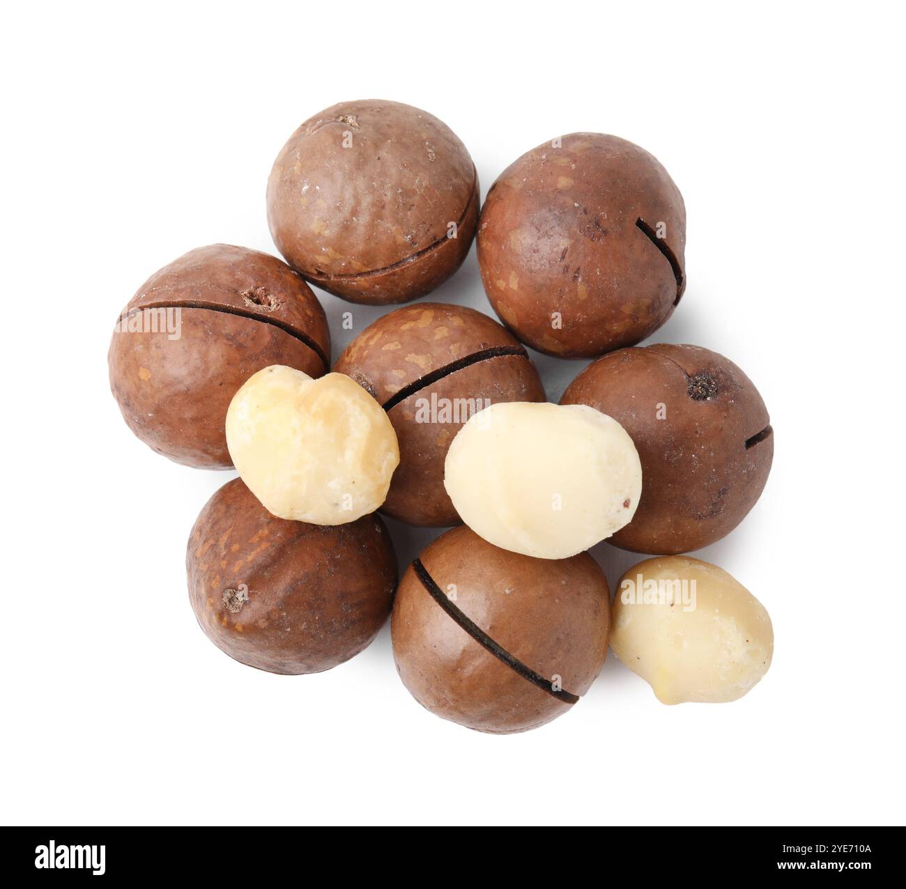 Macadamia nuts with shells isolated on white, top view Stock Photo - Alamy