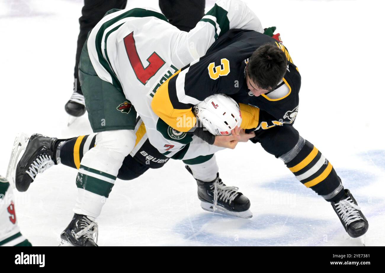 The Pittsburgh Penguins watches as Pittsburgh Penguins defenseman Jack ...