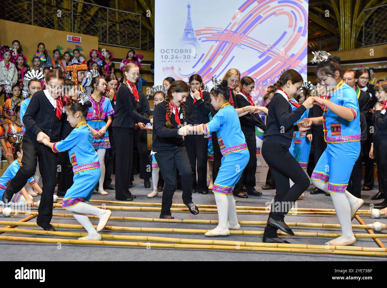 Children from Paris Children's Choir learn bamboo pole dancing ...