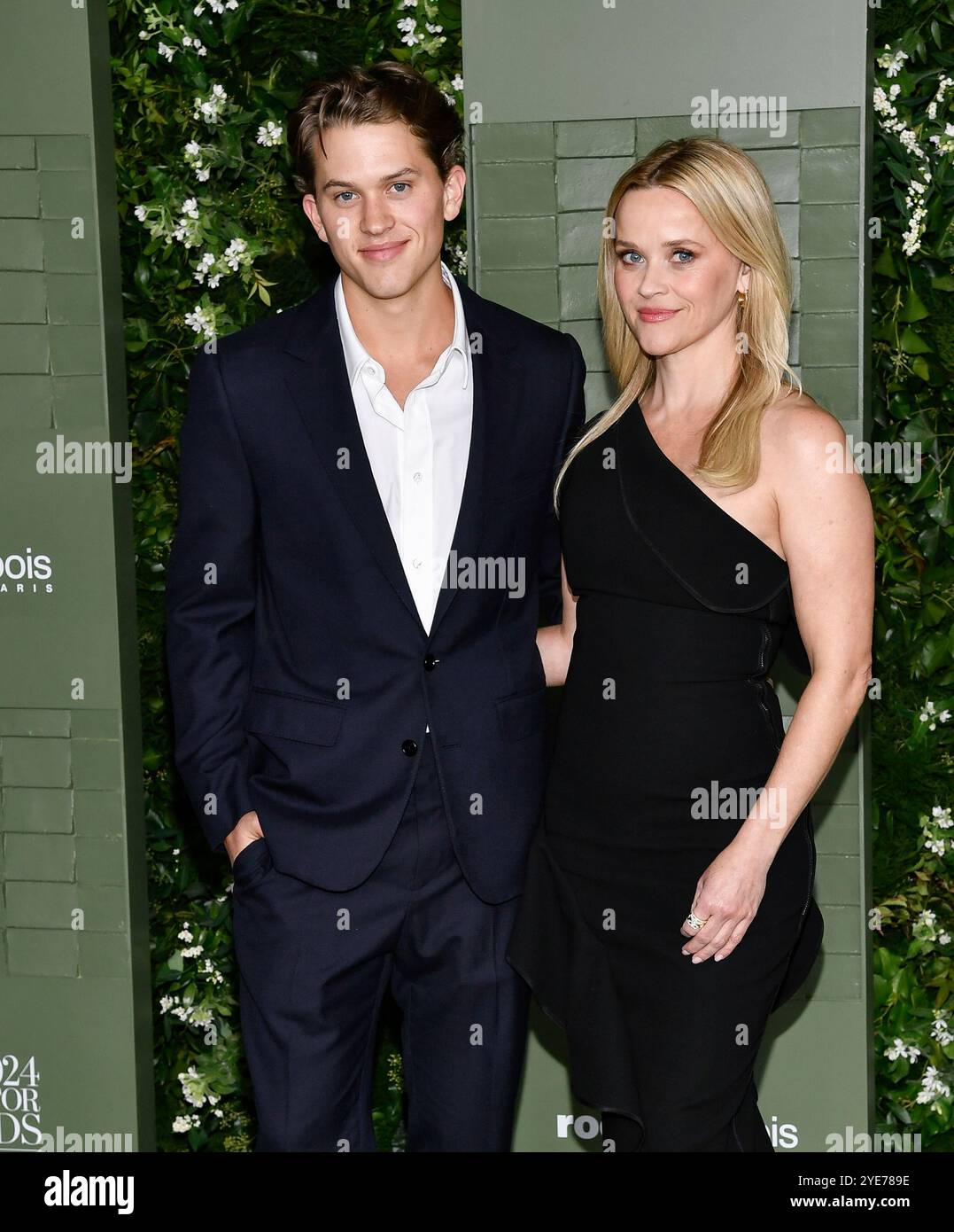 Reese Witherspoon, right, and son Deacon Phillippe attend the WSJ ...