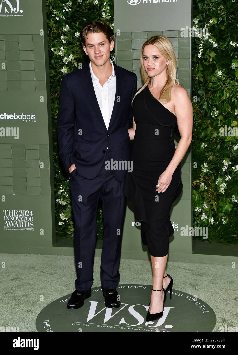 Reese Witherspoon, right, and son Deacon Phillippe attend the WSJ ...