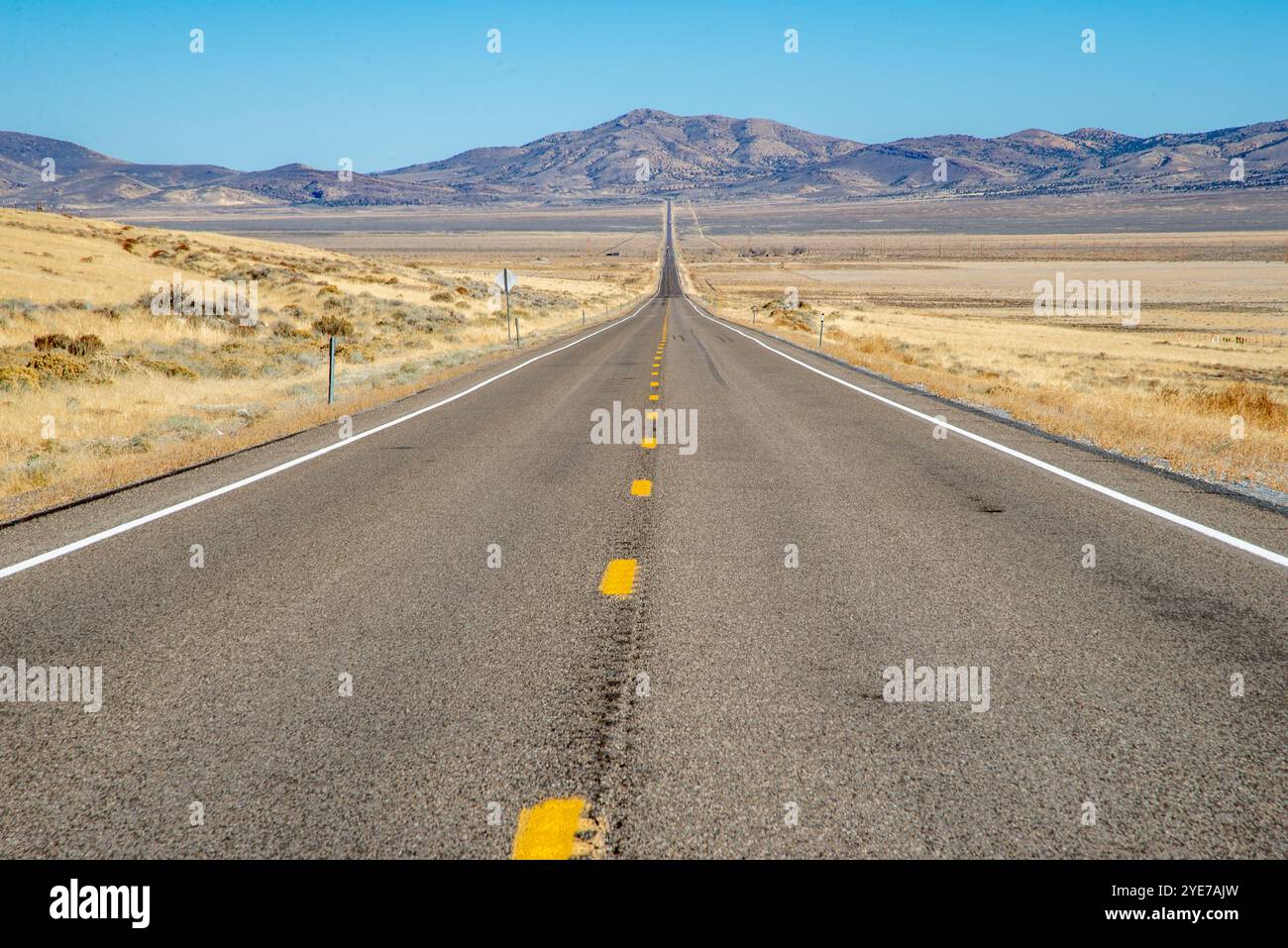 Long, straight section of highway in the desert Southwest Stock Photo ...
