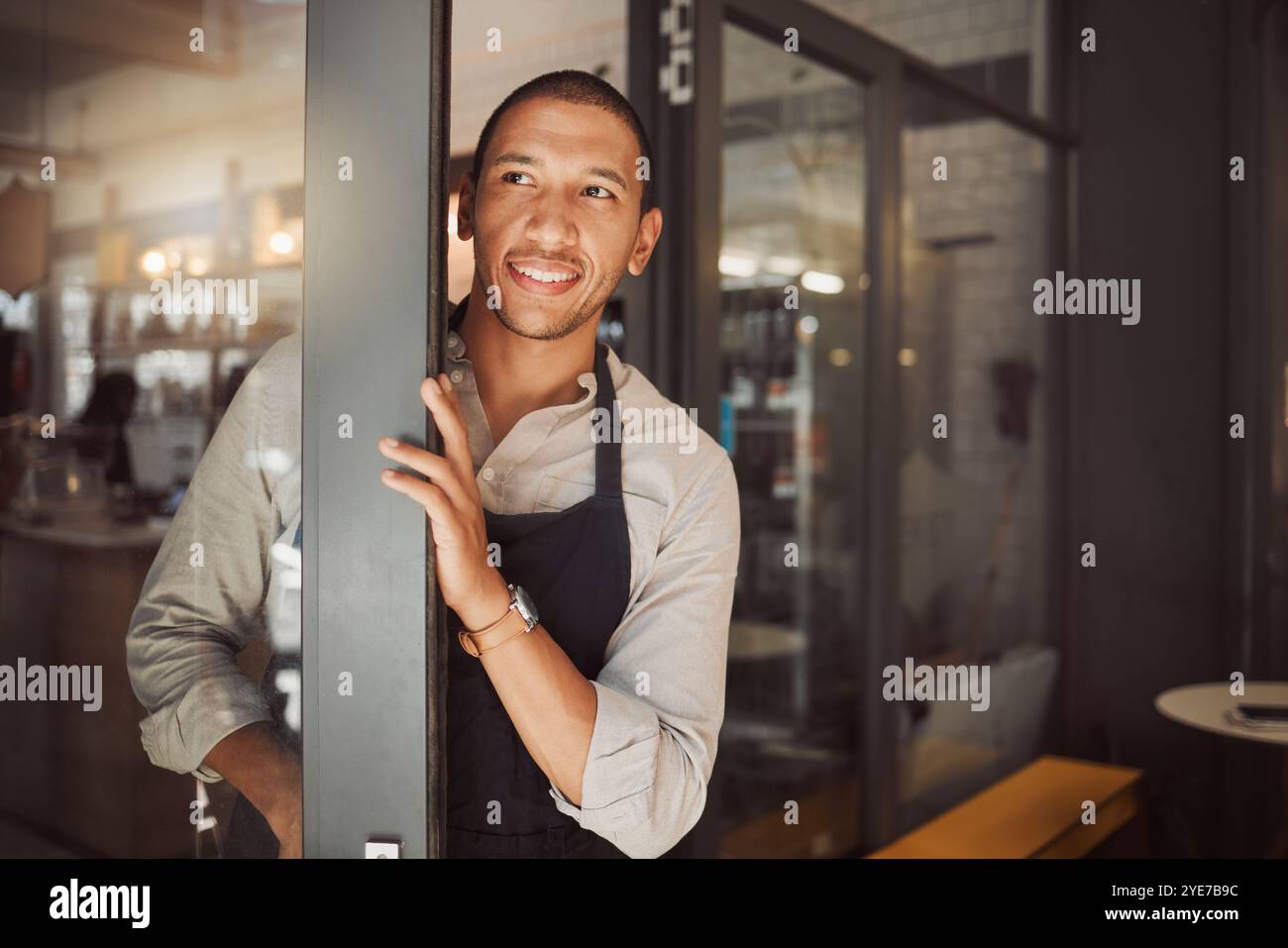 Thinking, man and business owner at entrance of cafe with welcome ...