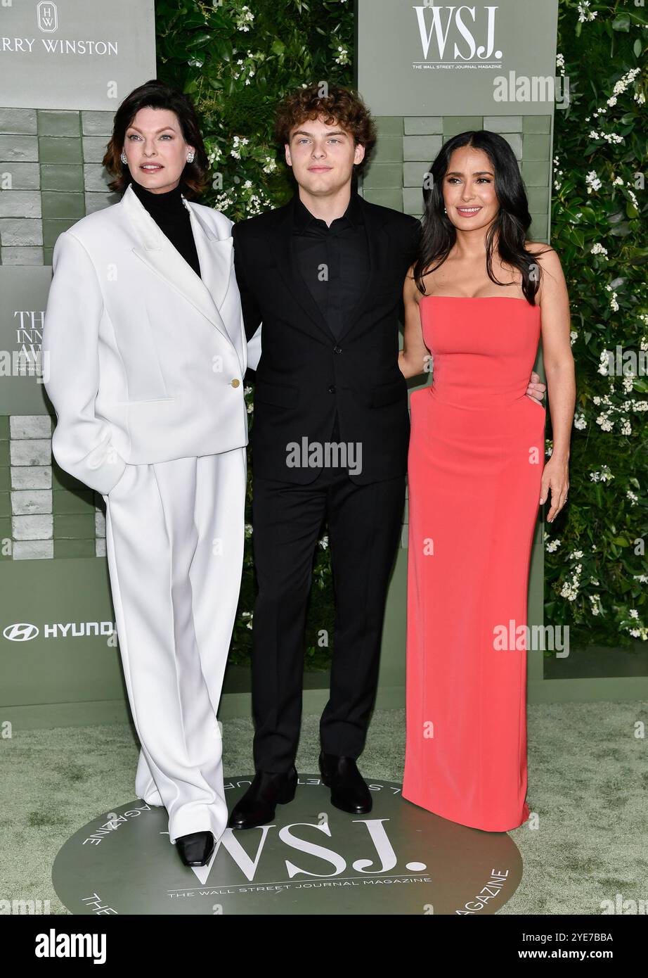 Linda Evangelista, left, Salma Hayek Pinault and Augustin Evangelista ...