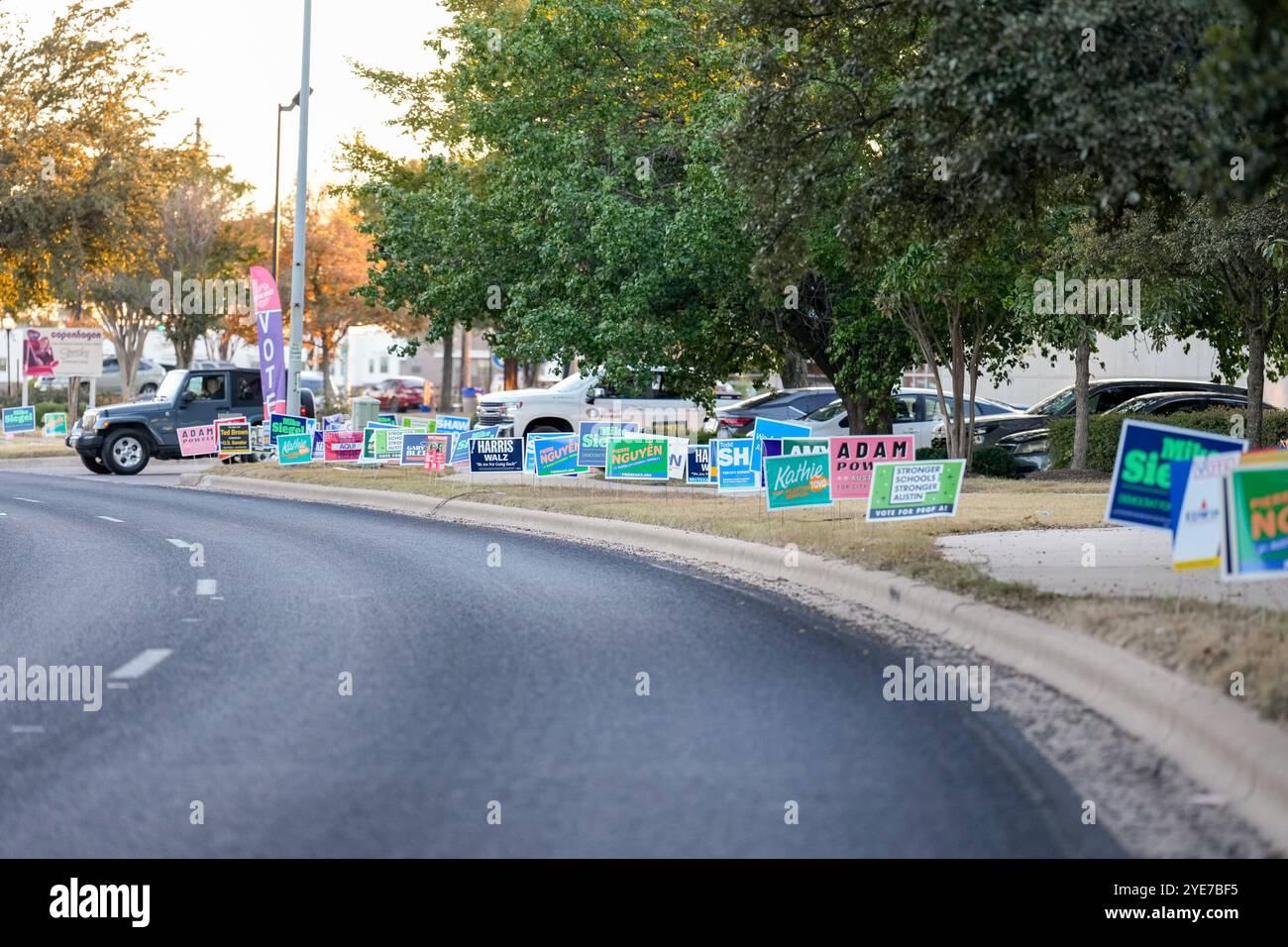Political signs are on display outside a polling place as early voting ...