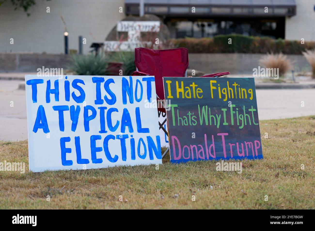 Residents display political signs and slogans as early voting is ...