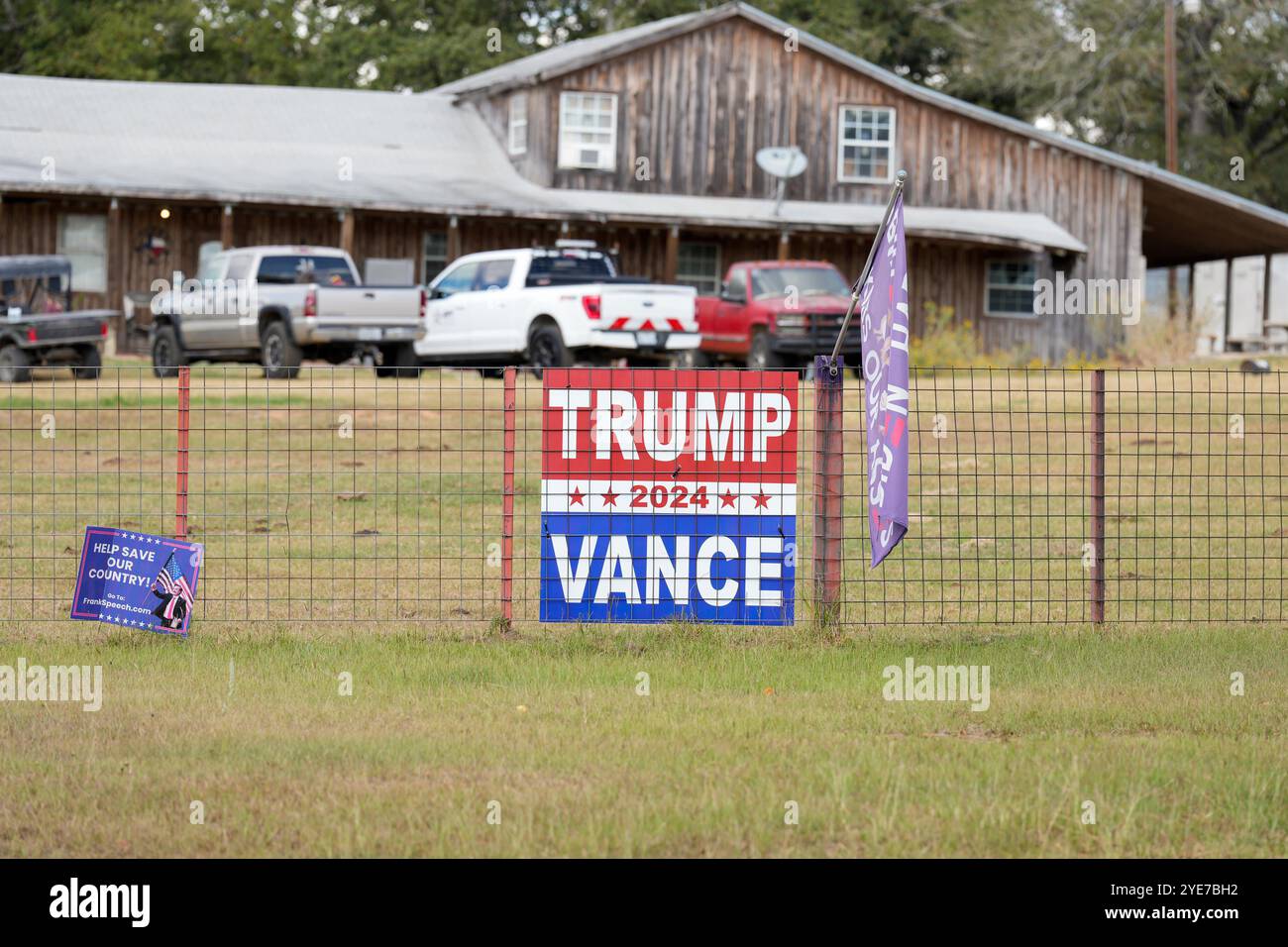 Residents display political signs and slogans as early voting is ...