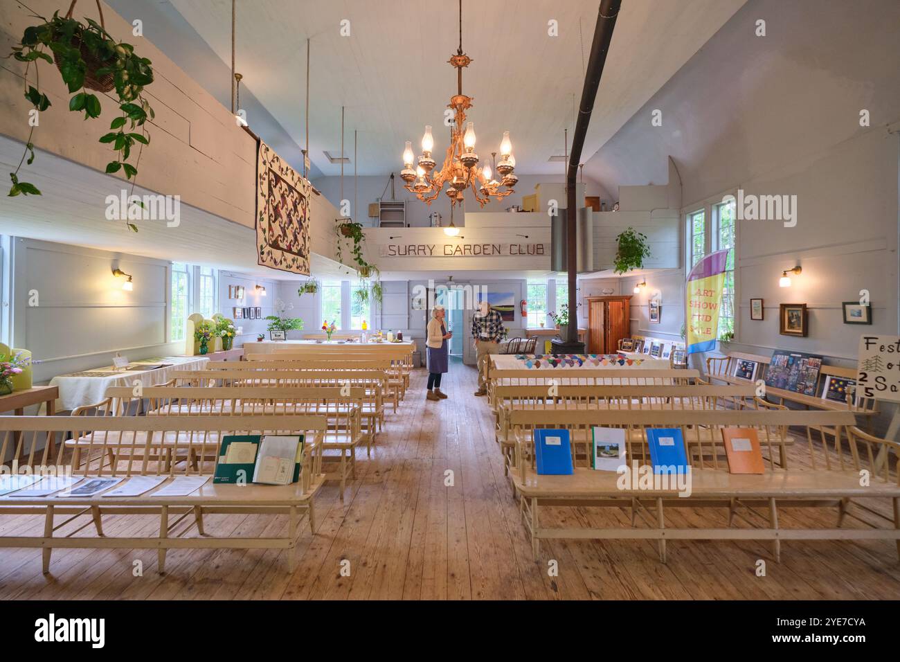 The simple, humble meeting room with wood benches. At the community ...