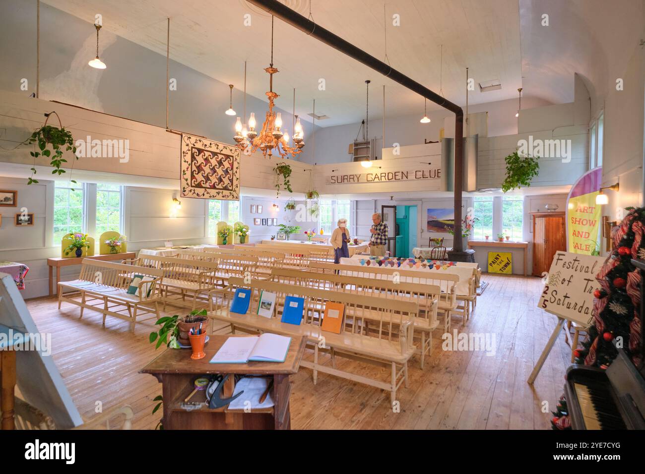 The simple, humble meeting room with wood benches. At the community ...