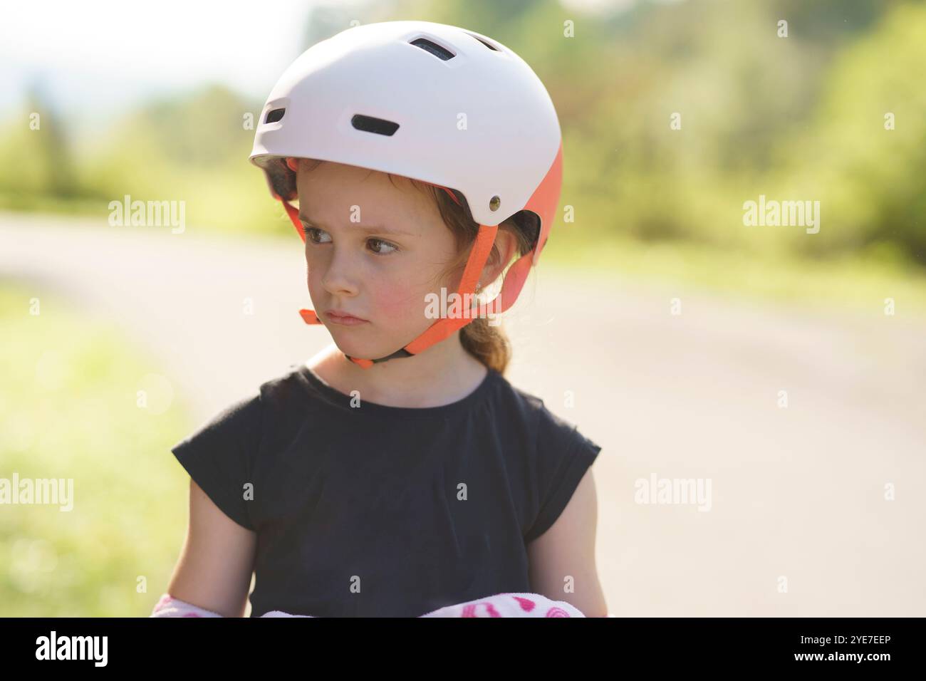 Little cute girl in helmet close up. Child safety concept Stock Photo ...